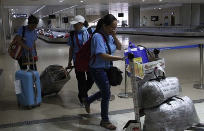 35 distressed OFWs repatriated from Kuwait - The Filipino Times