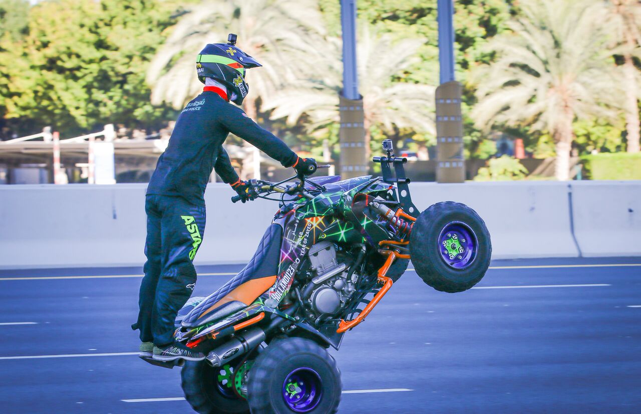 Dubai Police break Guinness record for the longest wheelie on ATV - The ...