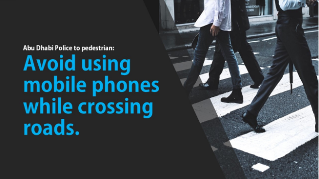 Pedestrians in Abu Dhabi reminded not to use phone while crossing roads ...