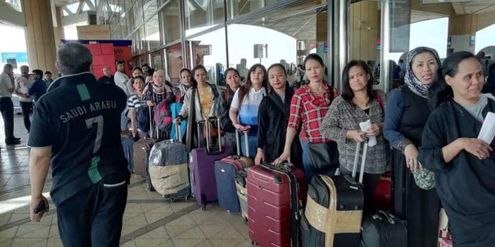Distressed OFWs in Saudi return home - The Filipino Times