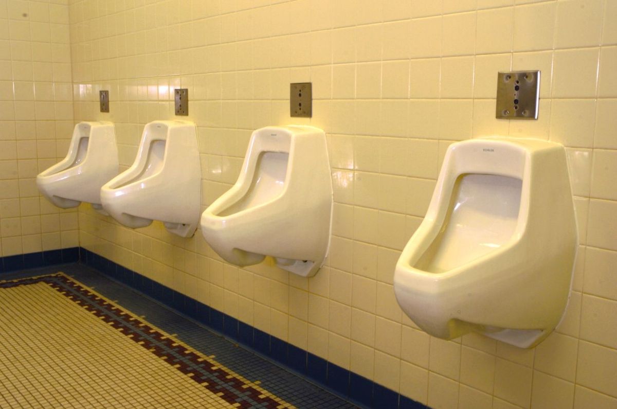 Ex-policemen accused of ordering homeless man to lick urinal - The ...