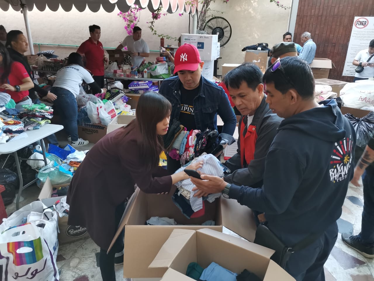IN PHOTOS: UAE-based Filipinos embody spirit of Bayanihan to help ...