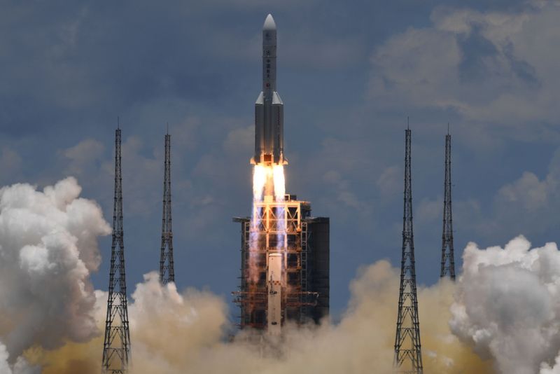 IN PHOTOS: China launches rocket to Mars as part of space race with US ...