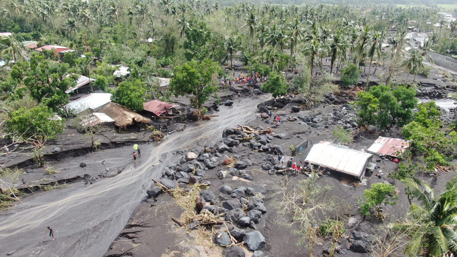 LOOK: Lahar from Mayon Volcano envelops homes in Albay in aftermath of Typhoon 'Rolly' - The ...