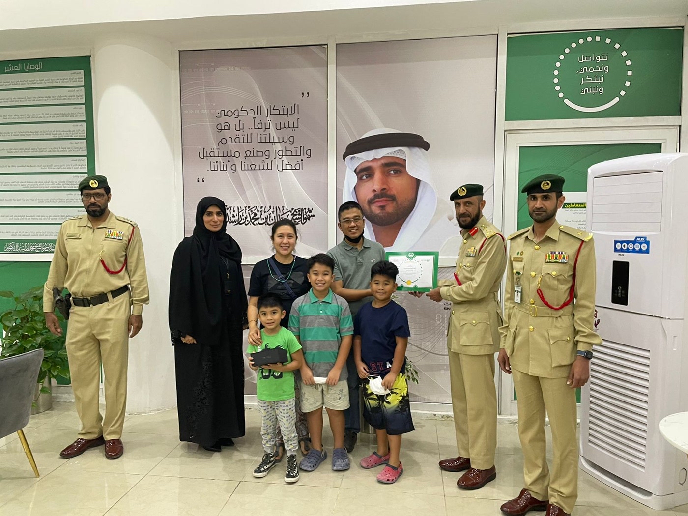 LOOK: Dubai Police honor 5-year-old Filipino boy for returning AED ...