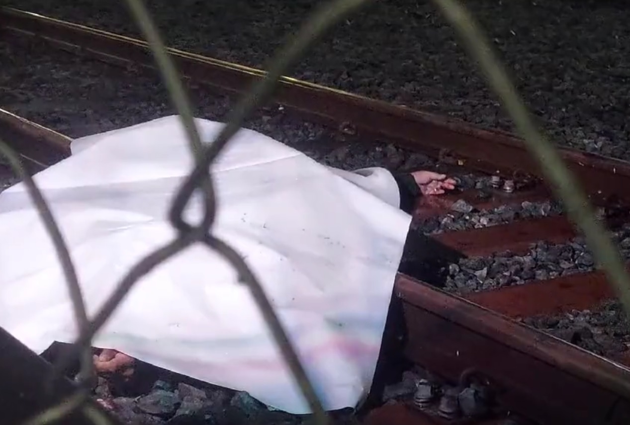 Two persons die after falling from flyover near MRT-3 tracks - The ...