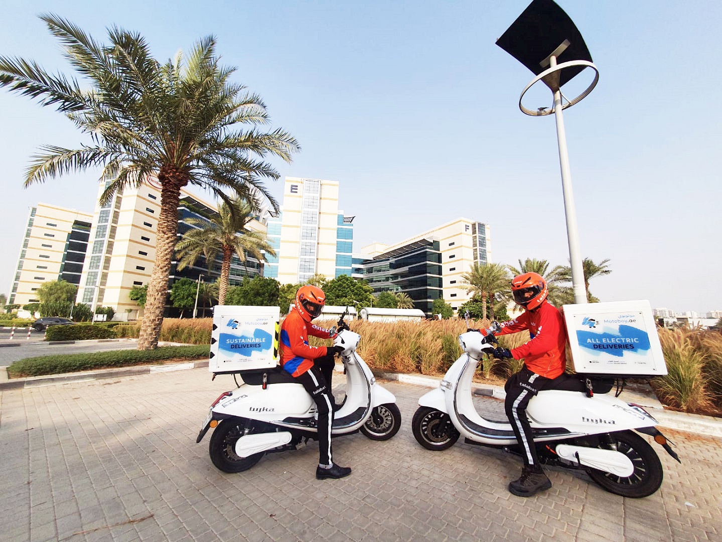 talabat UAE, Motoboy sign MOU to pilot electric bikes for sustainable ...