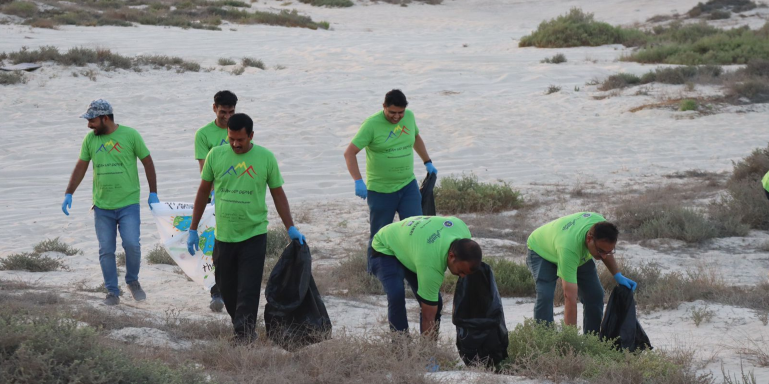 Filipino Mountaineers in UAE cleanup Al Sufouh Beach - The Filipino Times