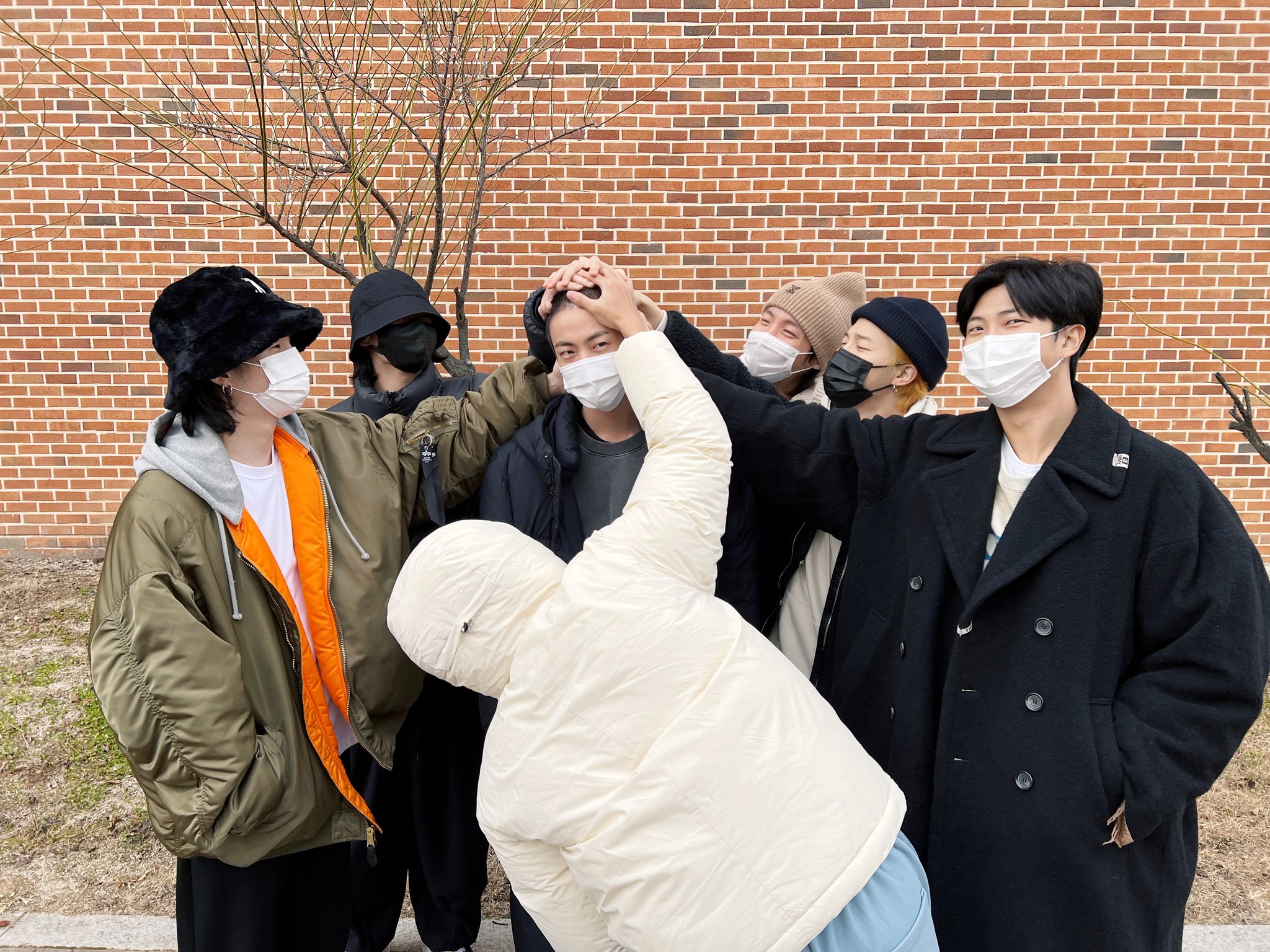 LOOK: BTS members send off Jin to begin mandatory military service ...