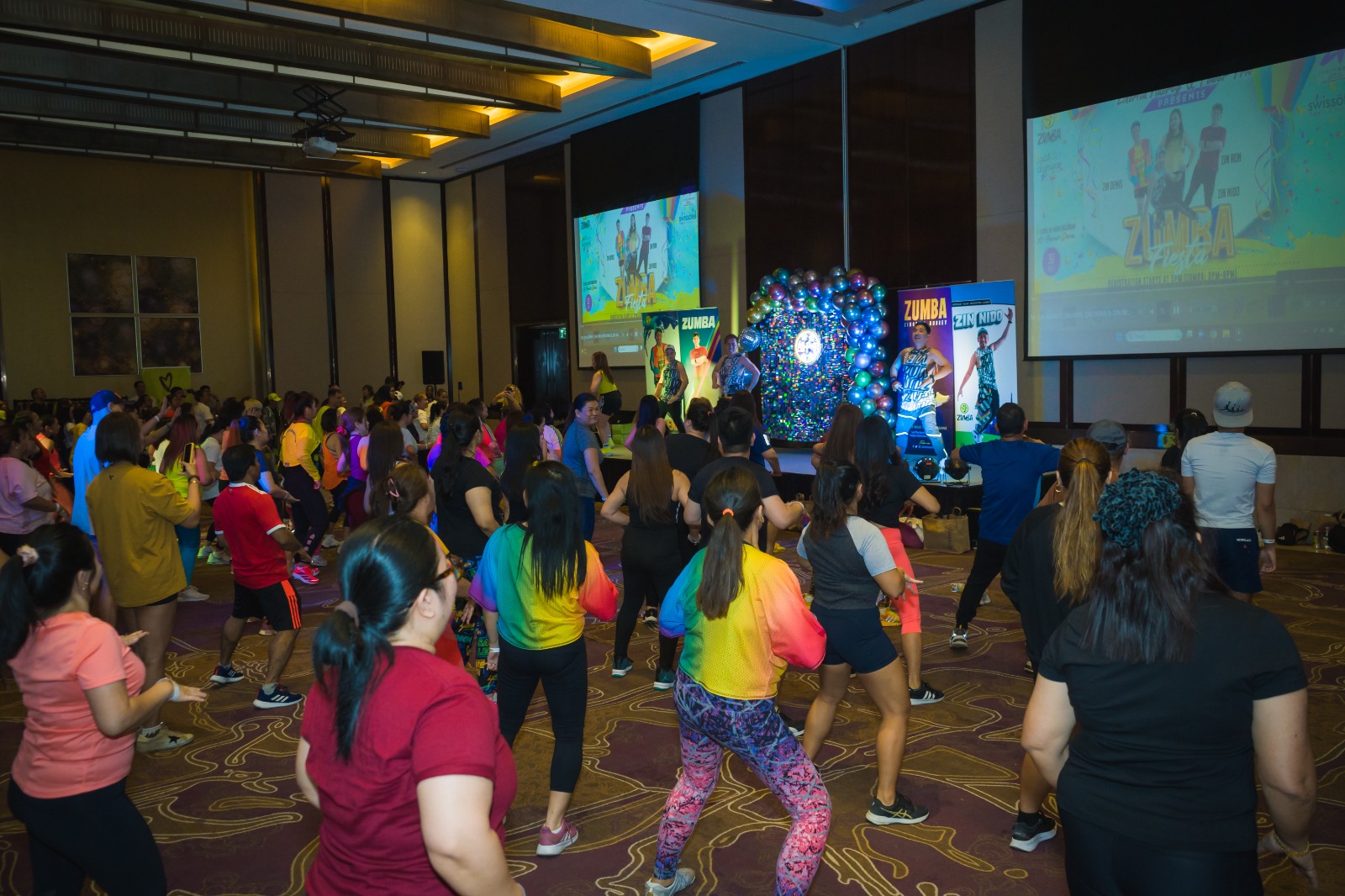 Filipina Zumba instructor leads over 100 participants in 'Zumba Fiesta ...