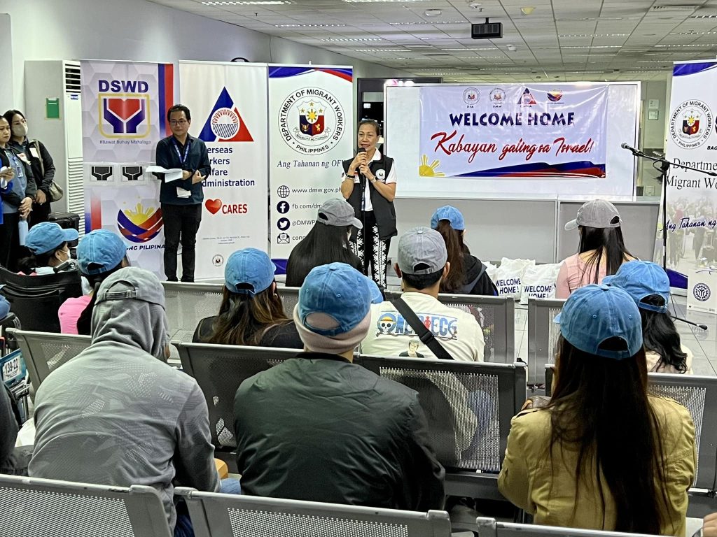 PH agencies welcome second batch of returning OFWs affected by Israel ...